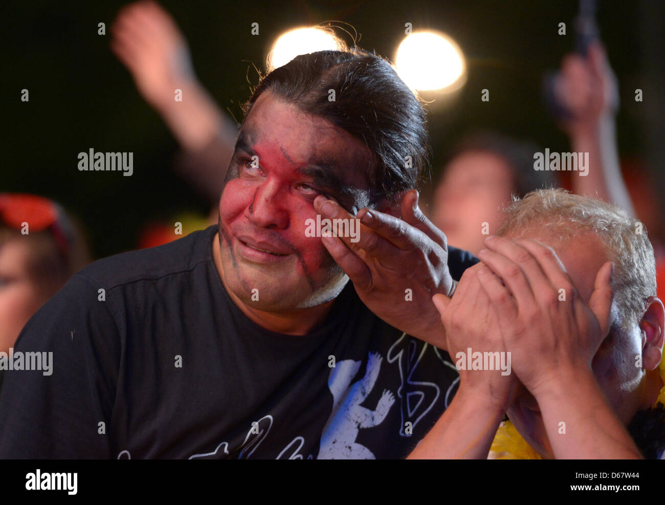 Soccer fans are sad after the semi final match of the UEFA EURO 2012 ...