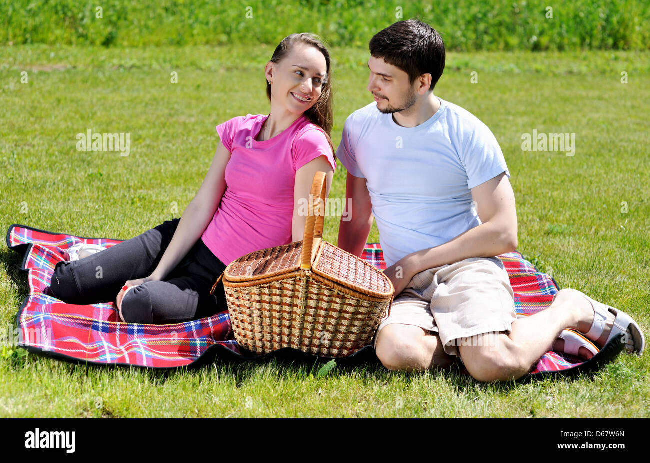 Couple on picnic Stock Photo - Alamy