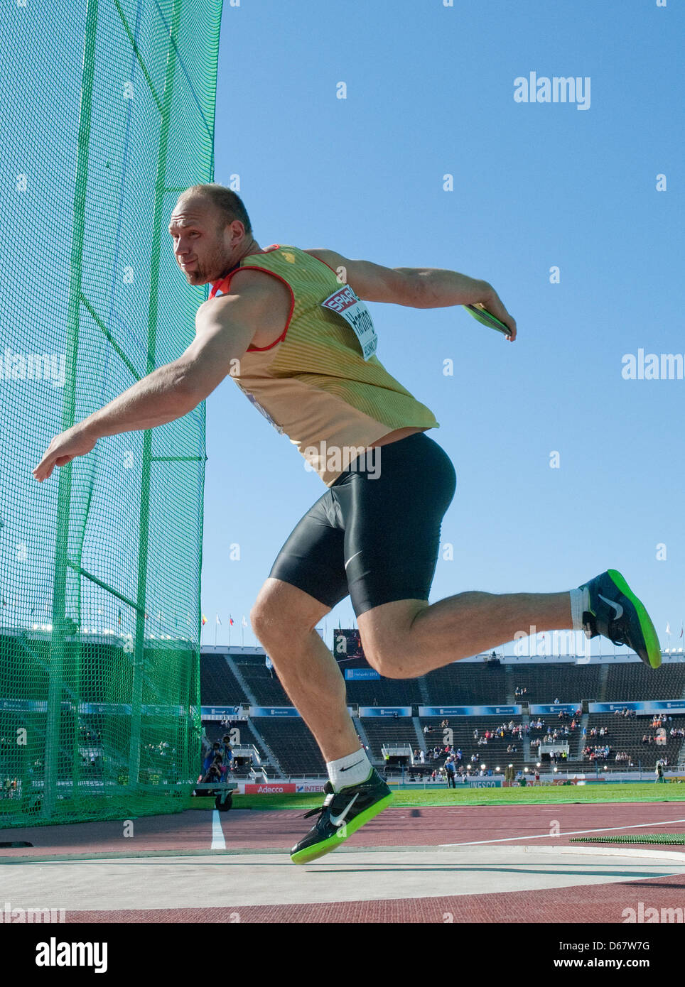 Robert Harting of Germany competes at the discus qualification of the ...