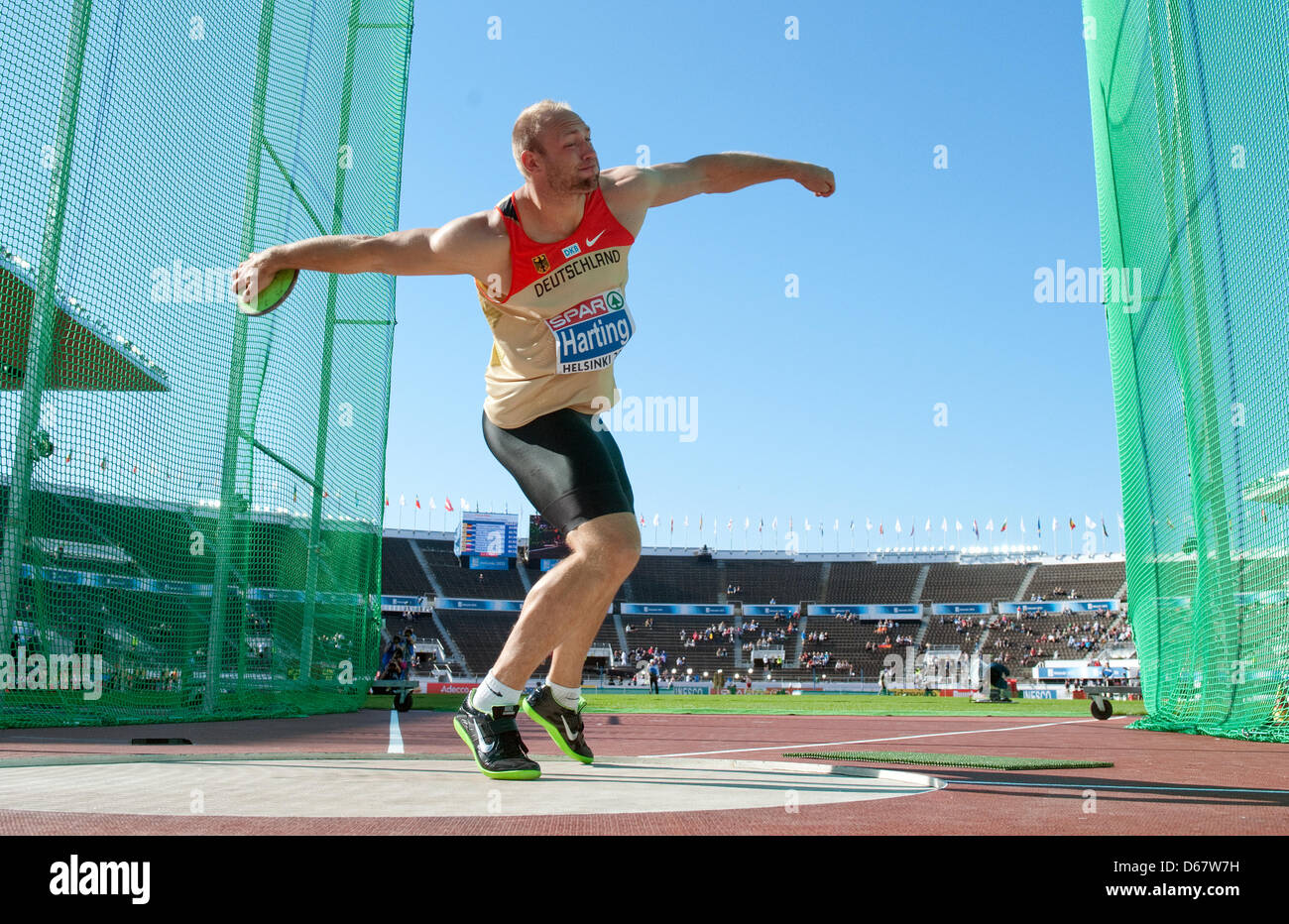 Robert Harting of Germany competes at the discus qualification of the ...