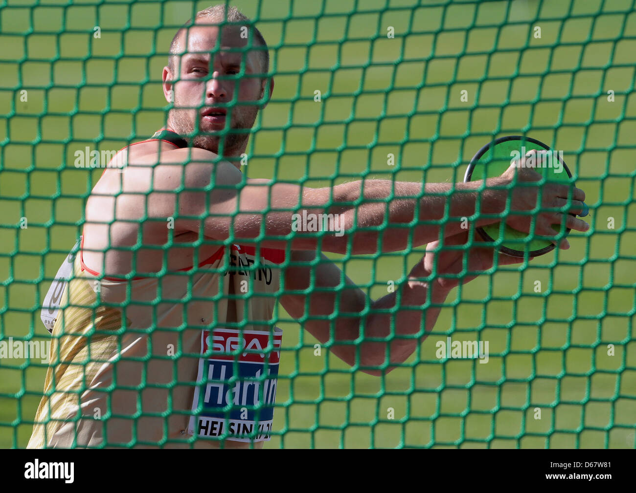 Robert Harting of Germany competes at the discus qualification of the ...