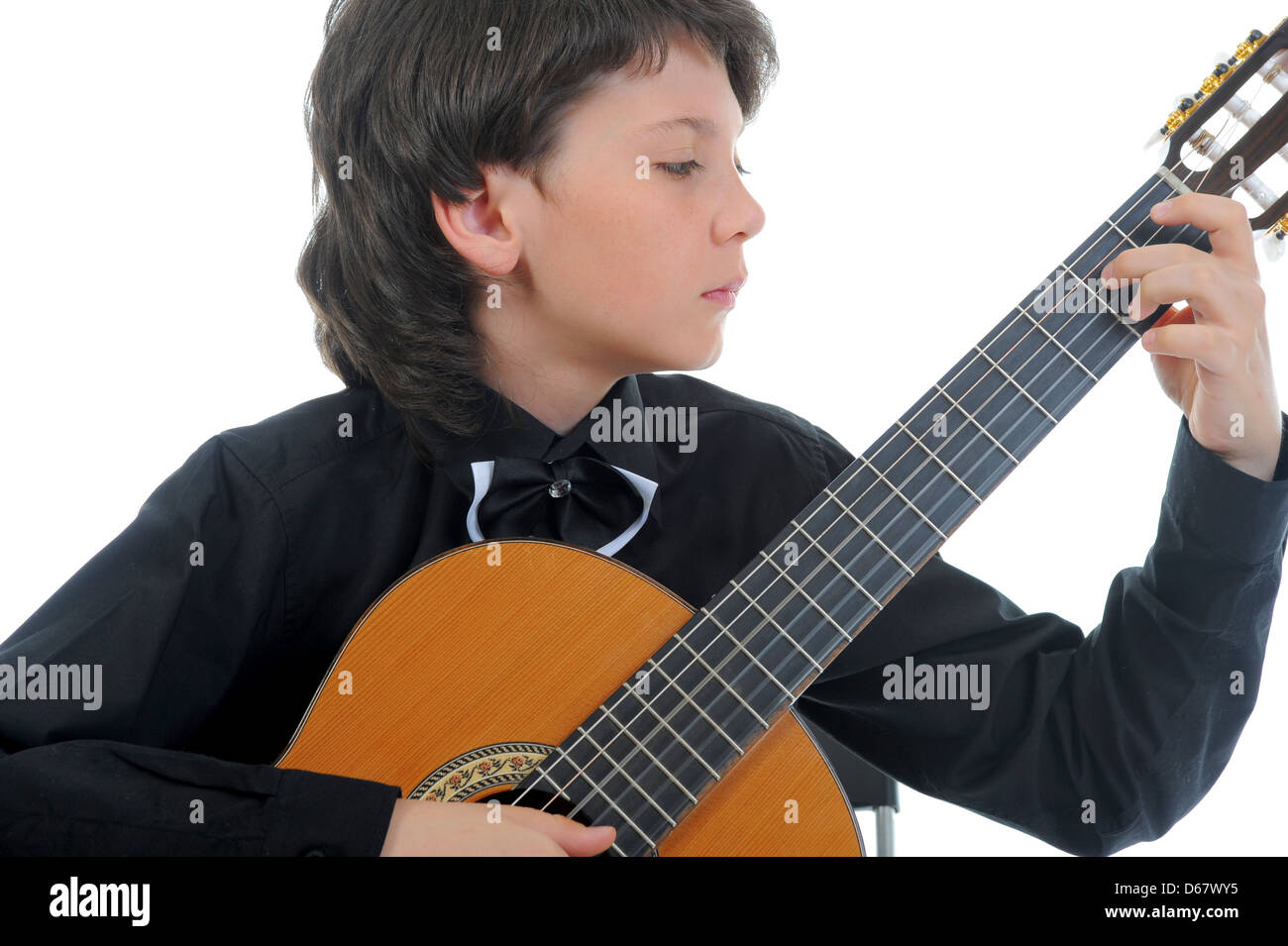 Little boy musician playing guitar Stock Photo - Alamy