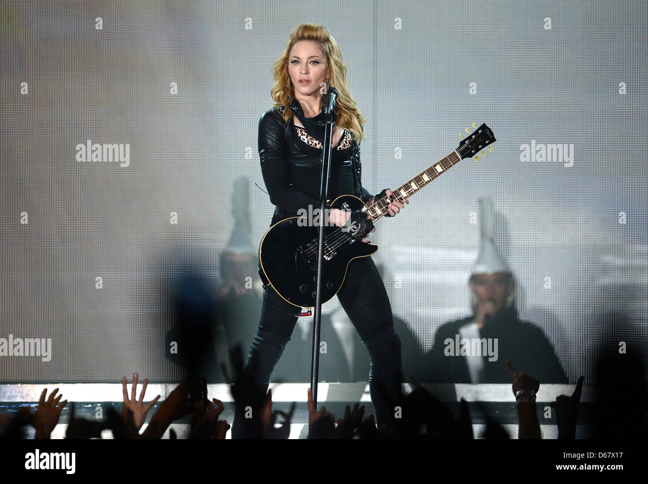 American singer Madonna performs on the stage at O2 World in Berlin ...