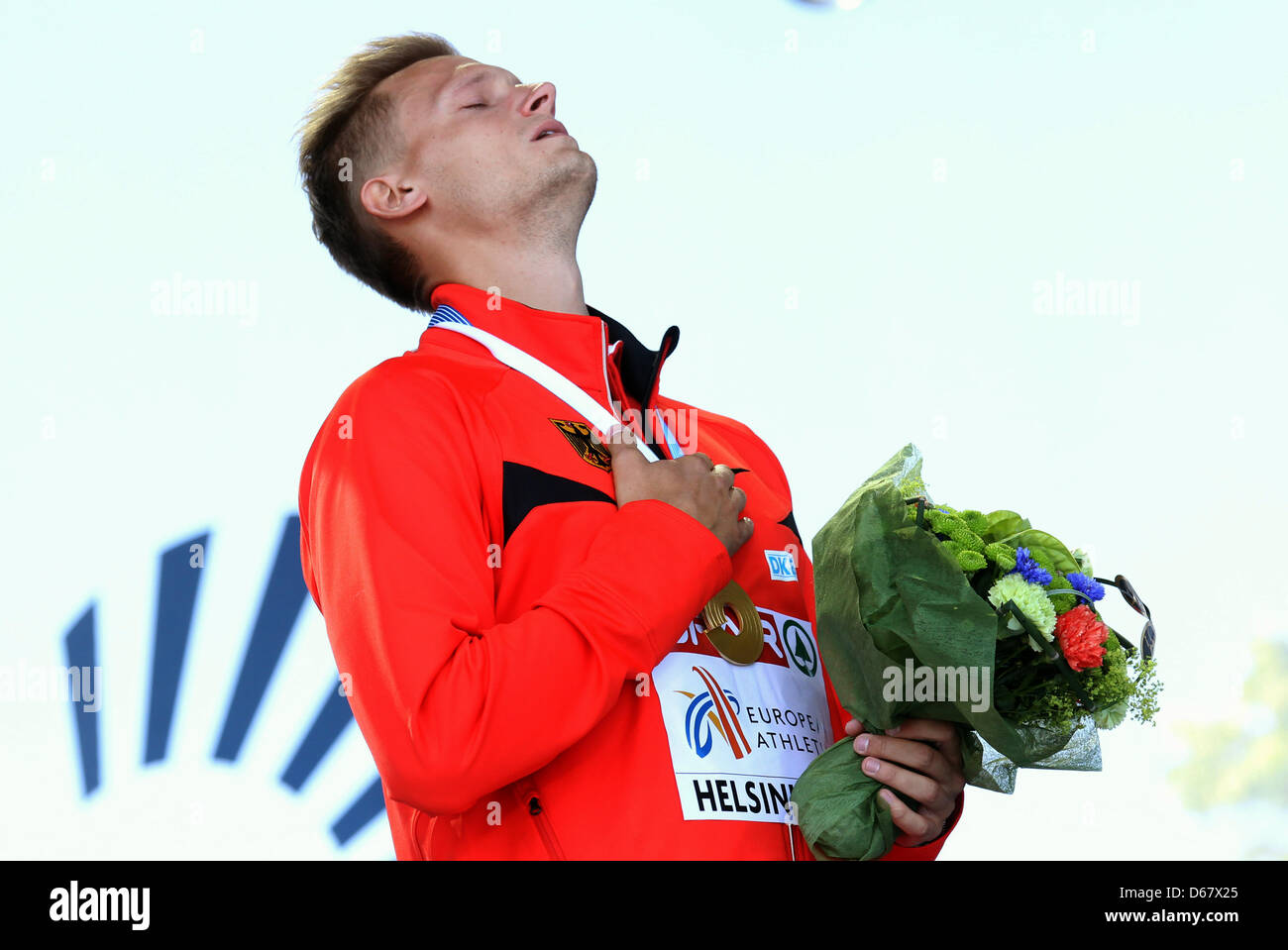 Pascal Behrenbruch of Germany displays his Gold Medal for the Decathlon ...