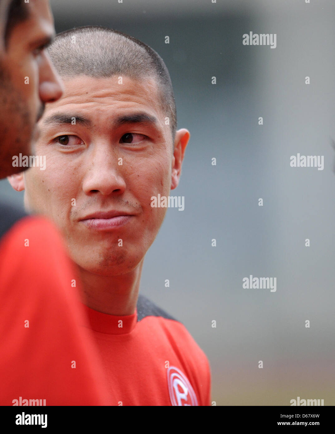 Duesseldorf's Du-Ri Cha takes part in the start of training after the ...