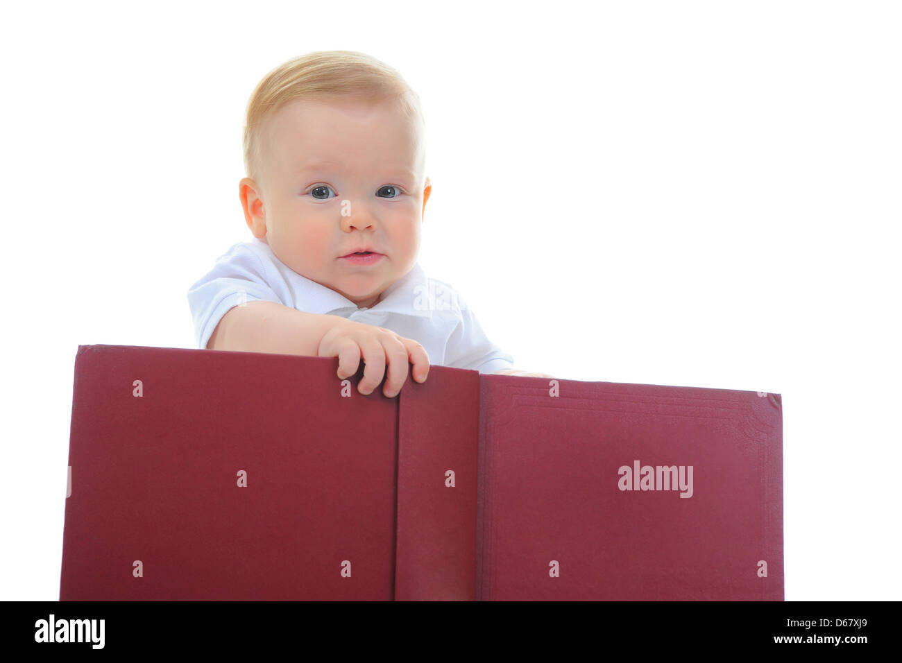 Little boy reads a big book Stock Photo - Alamy