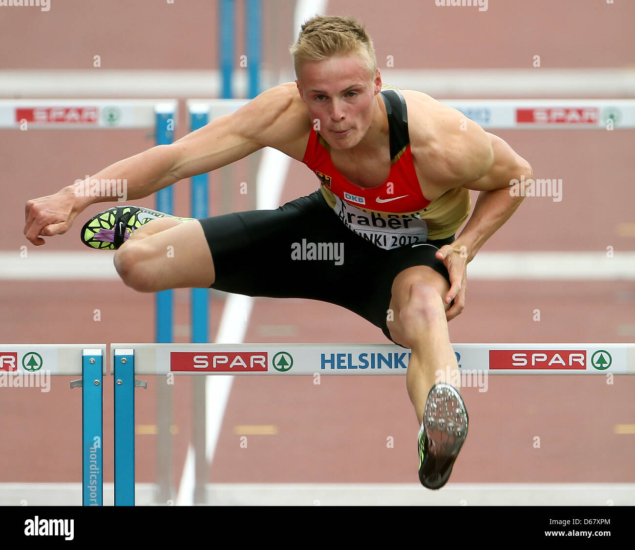 Gregor Traber of Germany competes during the 110m Hurdles Round 1 at ...