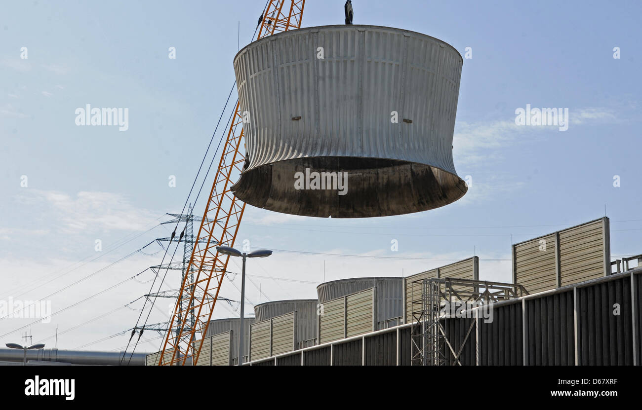A crane lifts a piece from a cell cooling tower of the nuclear power ...
