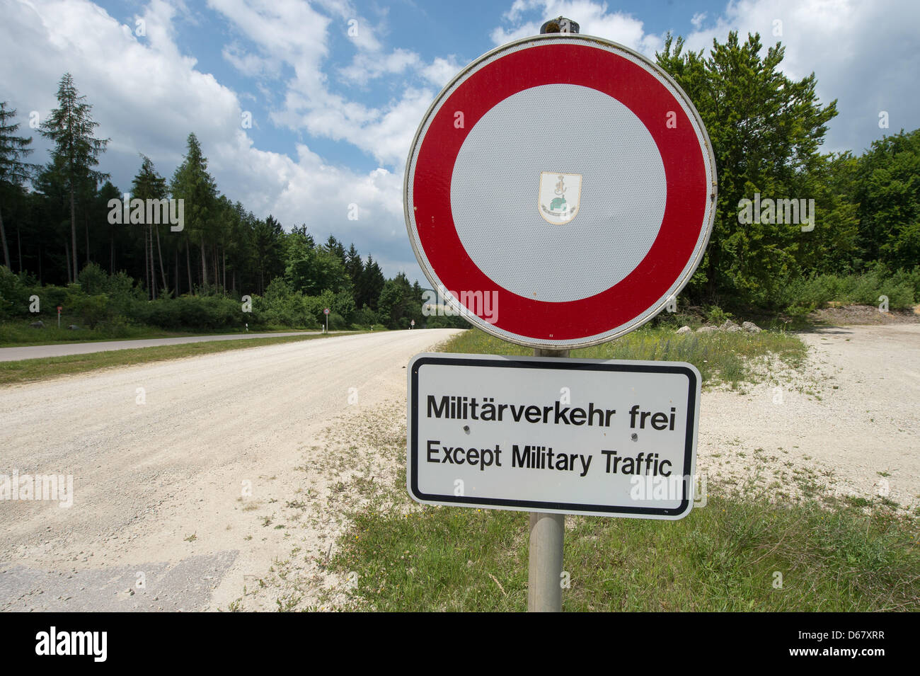 An 'Except military traffic' sign stands on the premises of the ...