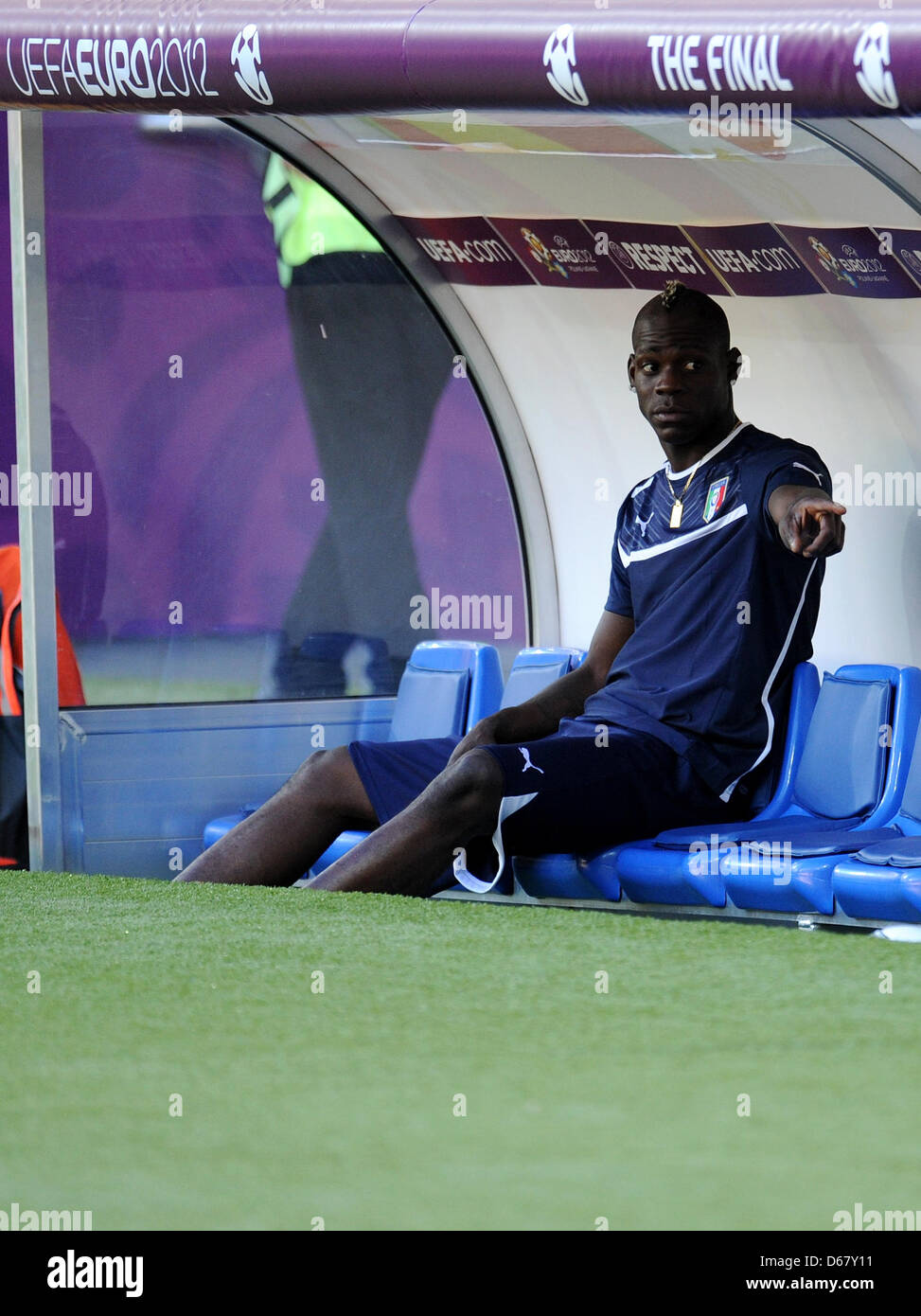 Italy's Mario Balotelli sits on the bench during a training session of ...
