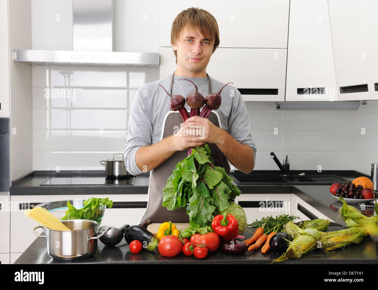 Man in kitchen Stock Photo - Alamy