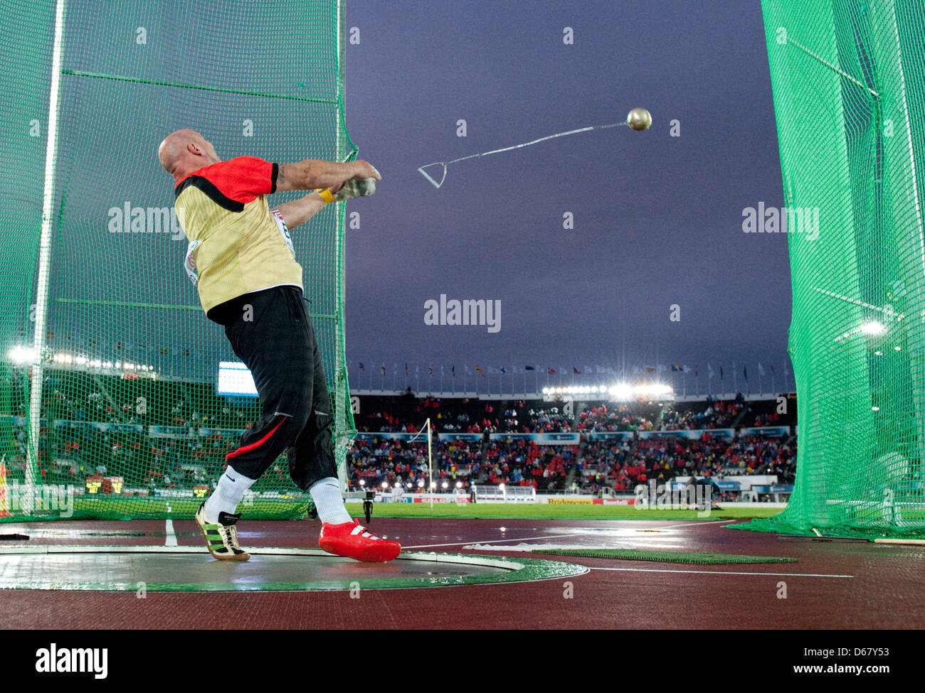 Markus Esser of Germany competes in the men's Hammer Throw final at the ...