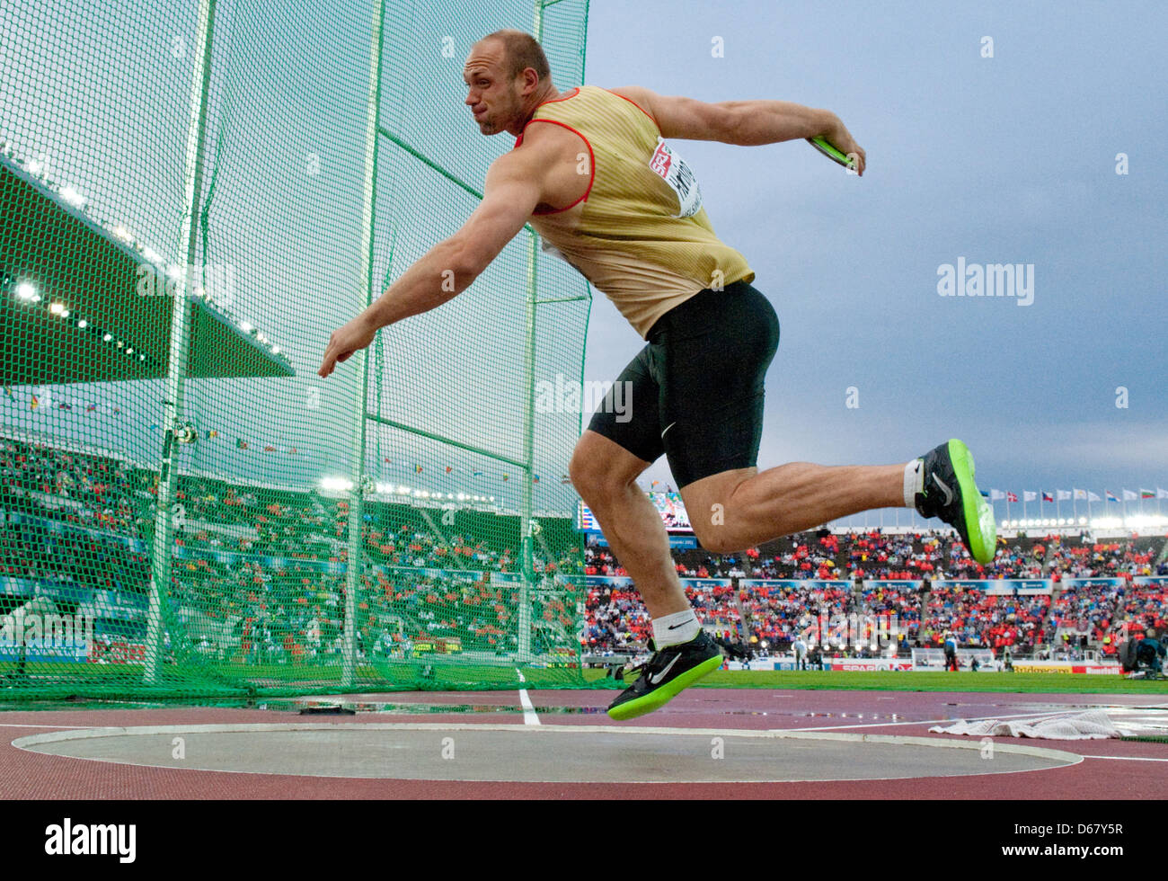 Robert Harting of Germany competes in the Discus Throw final at the ...