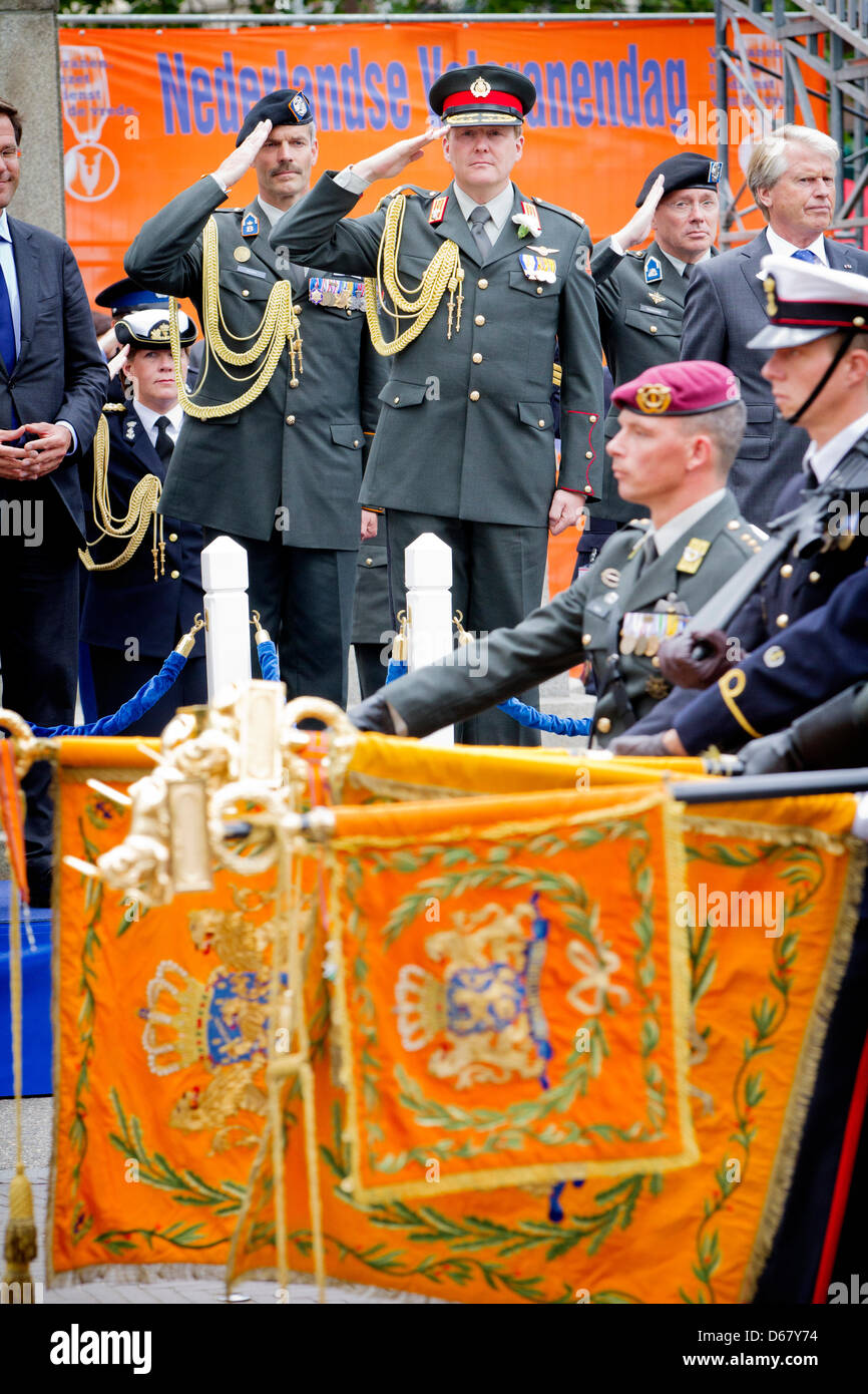 Prince Willem-Alexander of The Netherlands (C) attend the military ...