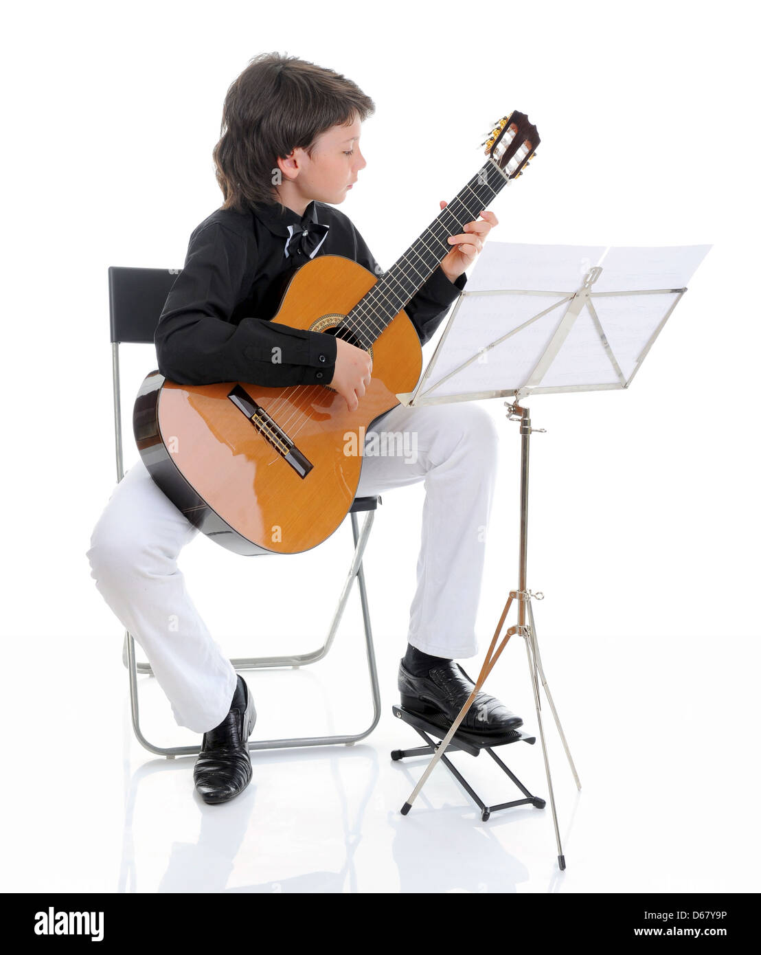 Little boy musician playing guitar Stock Photo - Alamy