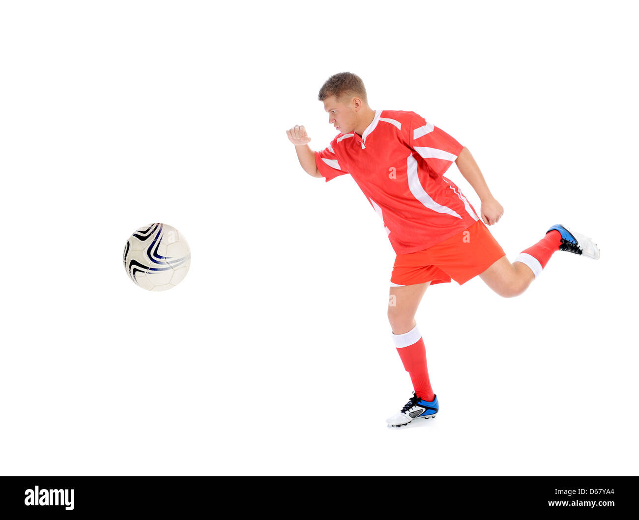 Boy playing football pass Cut Out Stock Images & Pictures - Alamy