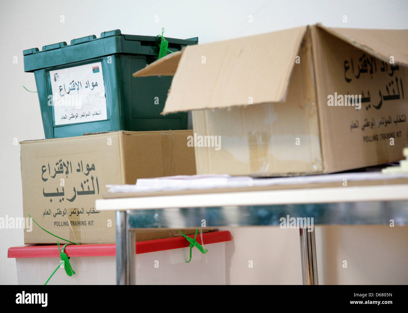 Boxes lettered in Arabian contain polling training kits for members of ...