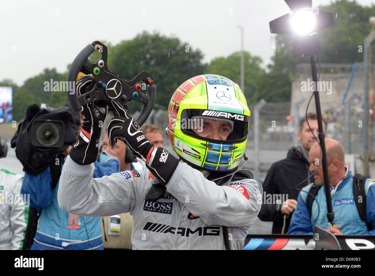 British driver Jamie Green of Mercedes celebrates after winning the ...