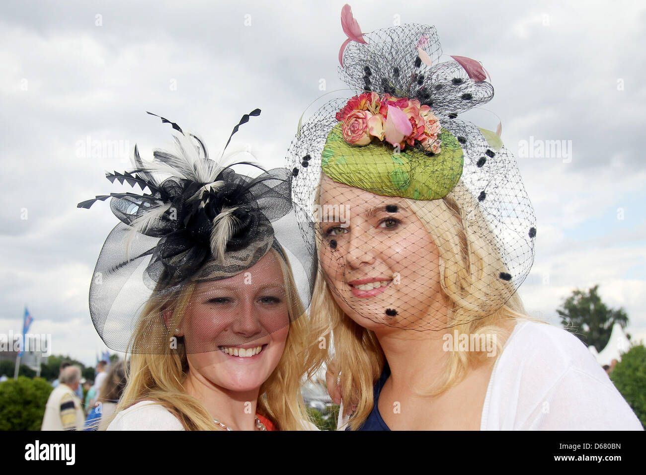 Woman wearing fancy hats are seen at the 143rd traditional German ...