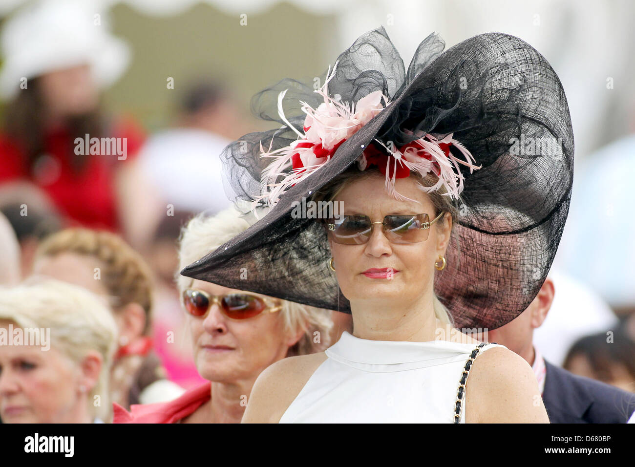 A woman wearing a fancy hat is seen at the 143rd traditional German ...