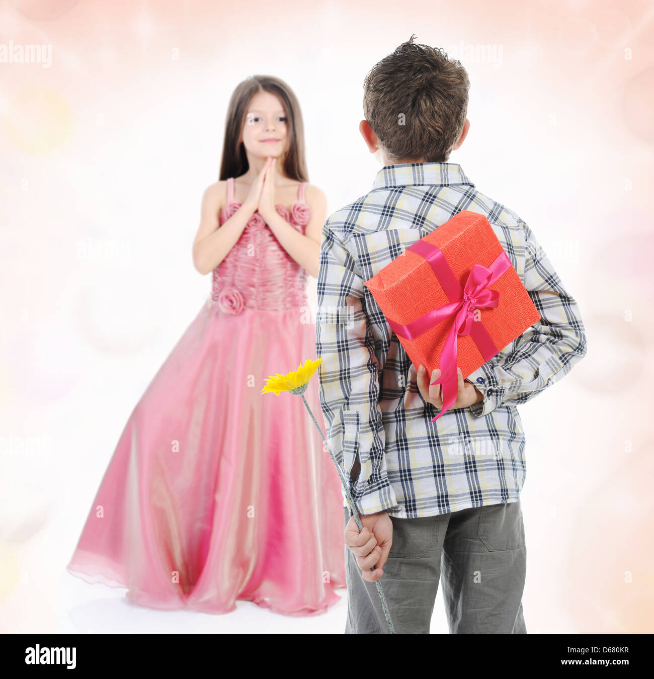 Small boy girl give present hi-res stock photography and images - Alamy