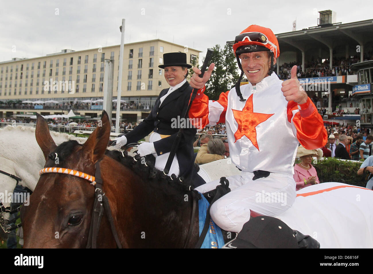 Jockey Terence Hellier sitting on his horse 'Pastorius' cheers after ...