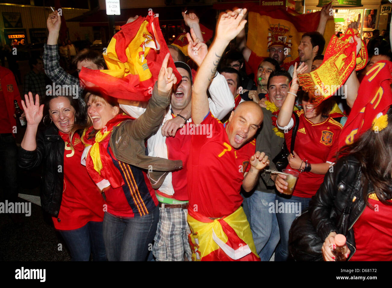 Spanish supporters celebrate the 4-0 victory of their team after the ...