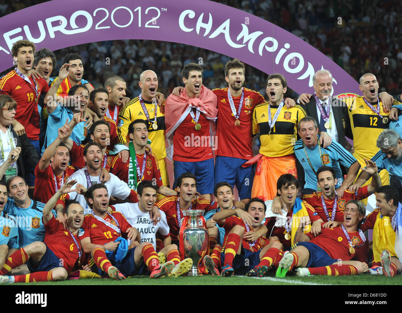Spanish players pose with the trophy after winning the UEFA EURO 2012 ...