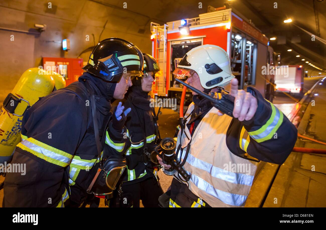 Firefighters coordinate their actions at an emergency practise in the ...