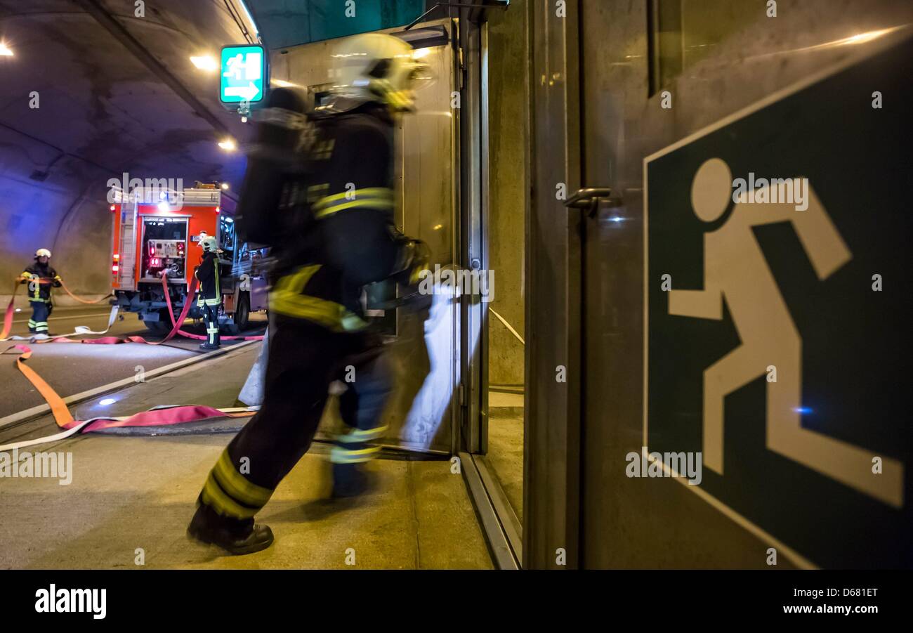 Firefighters are pictured in the Rennsteig Tunnel in Germany, 30 June ...