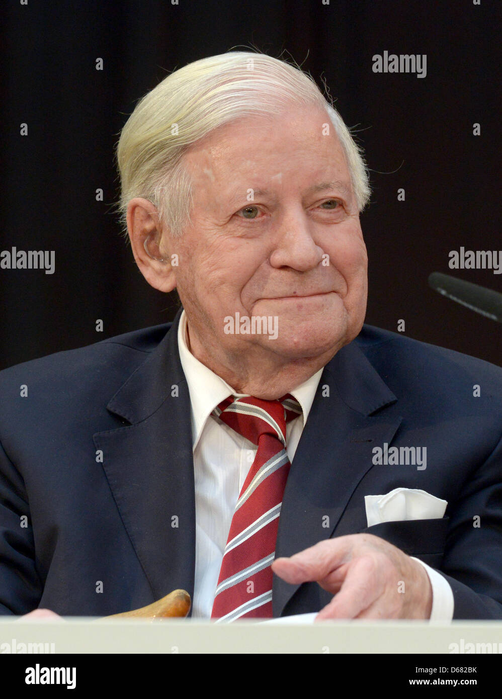 Former German Chancellor Helmut Schmidt smiles after he received the ...