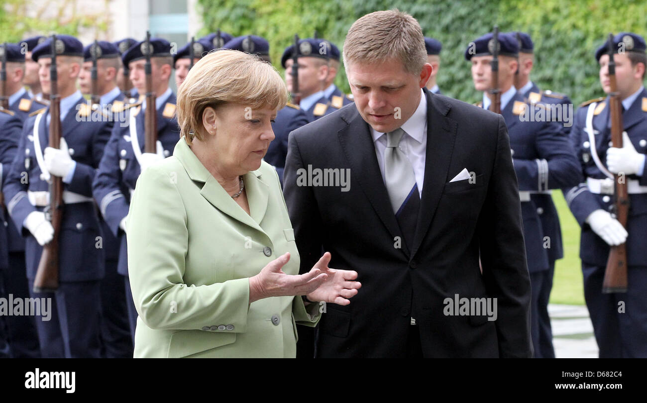 German Chancellor Angela Merkel receives Slovak Prime Minister Robert ...