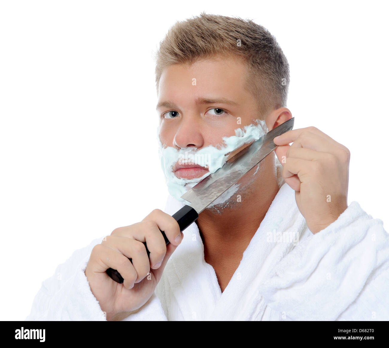 Young man shaving Stock Photo - Alamy