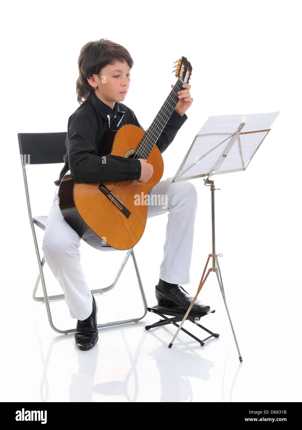 Little boy musician playing guitar Stock Photo - Alamy