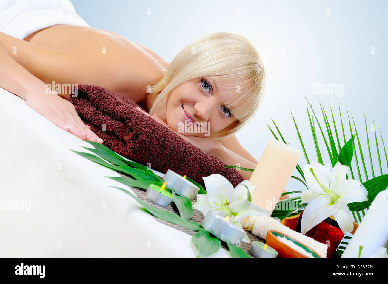 Young woman at spa procedure Stock Photo - Alamy