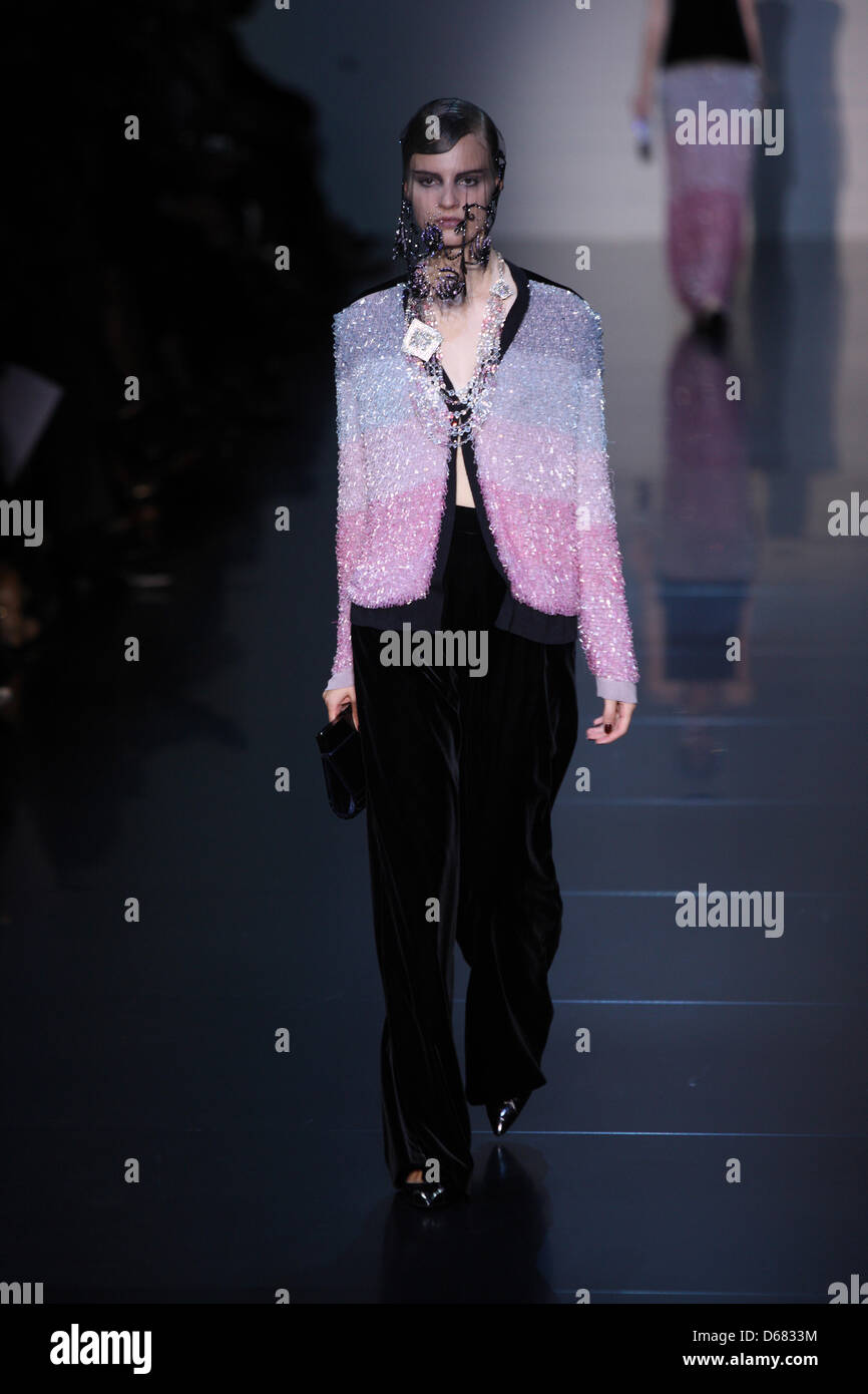 Models wear creations of Italian designer Giorgio Armani as part of the ...