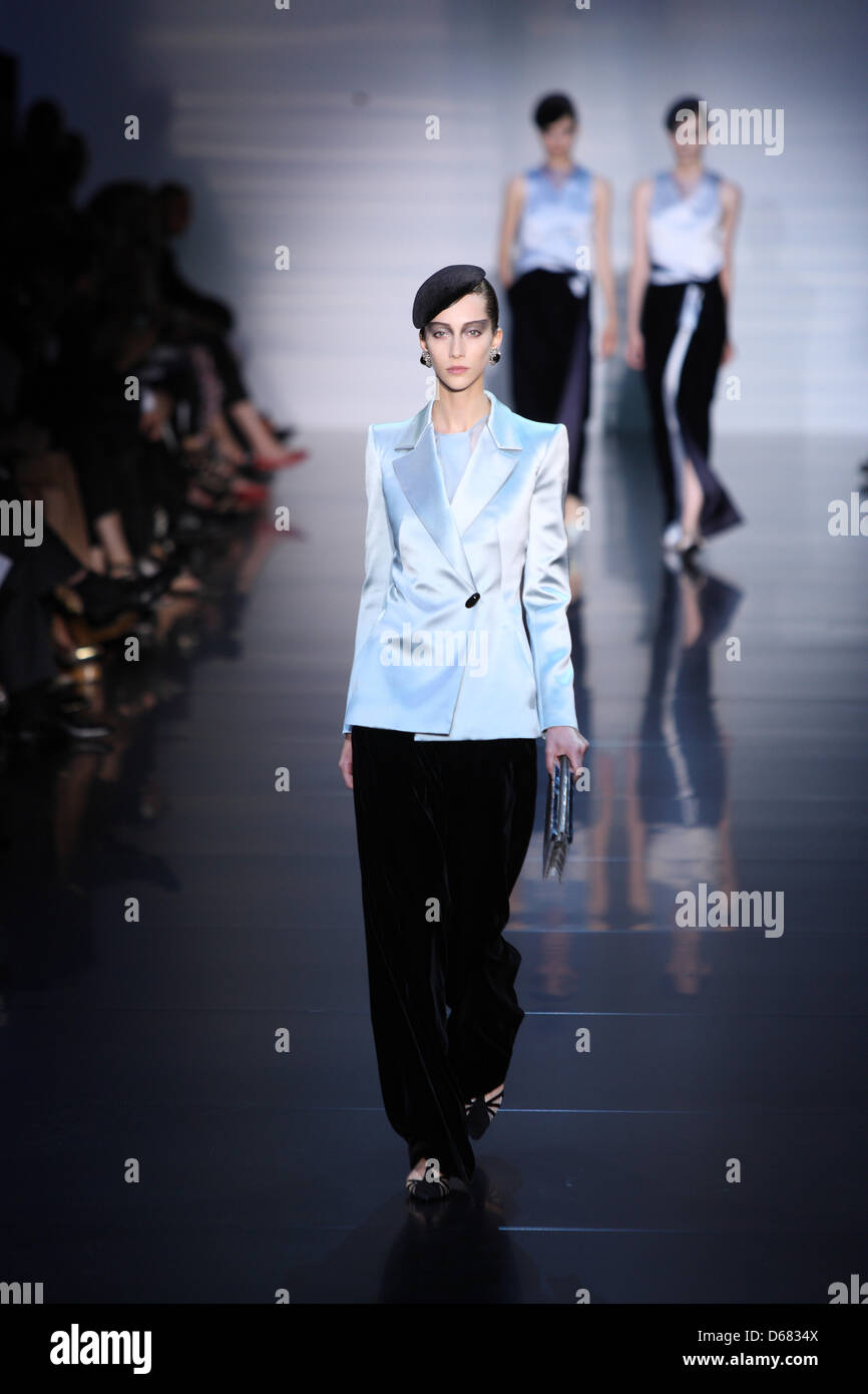 Models wear creations of Italian designer Giorgio Armani as part of the ...