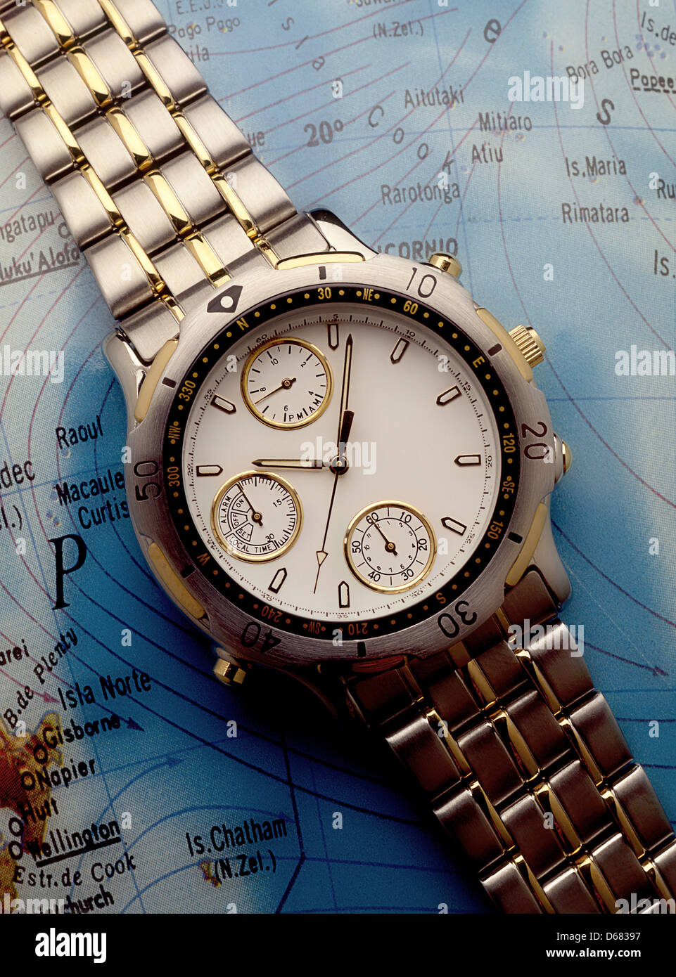 Wristwatch on a map Stock Photo - Alamy