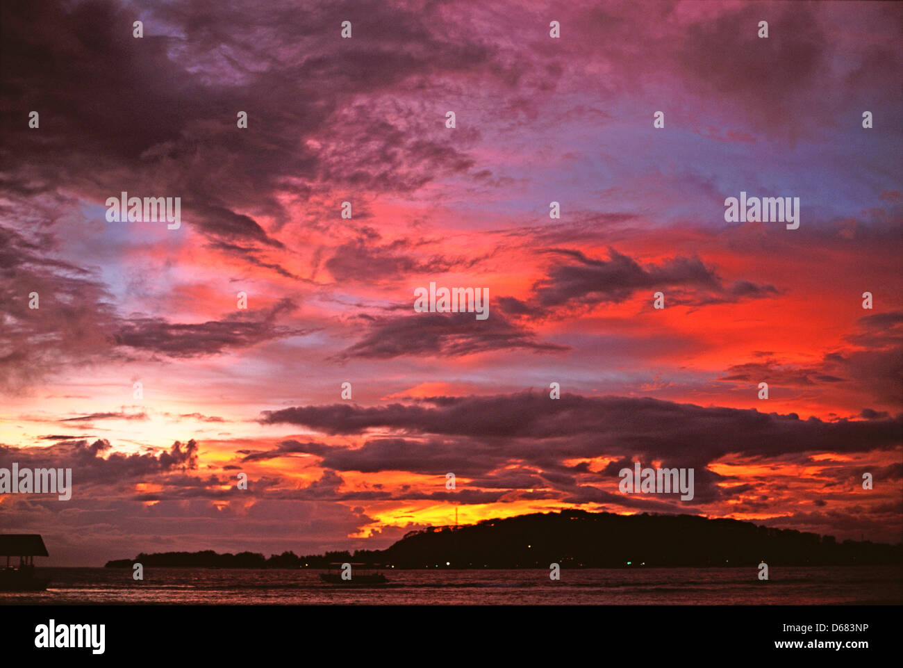 Sunset over harbour in Bali Stock Photo - Alamy