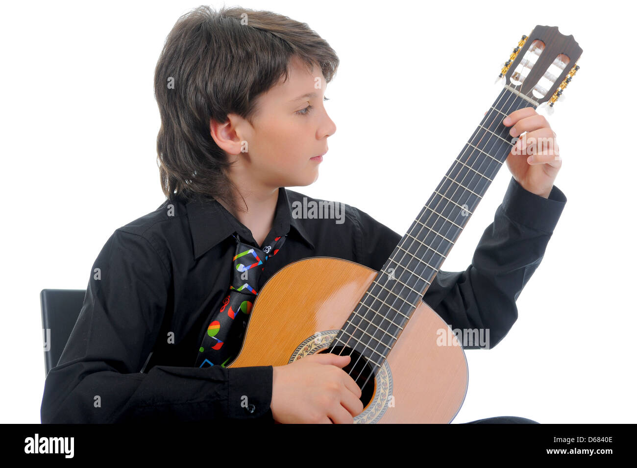 Little boy musician playing guitar Stock Photo - Alamy