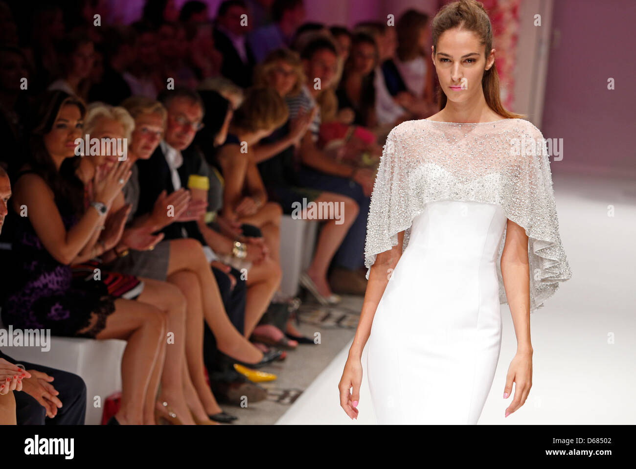 A model presents a creation at the Basler show during the Mercedes-Benz ...