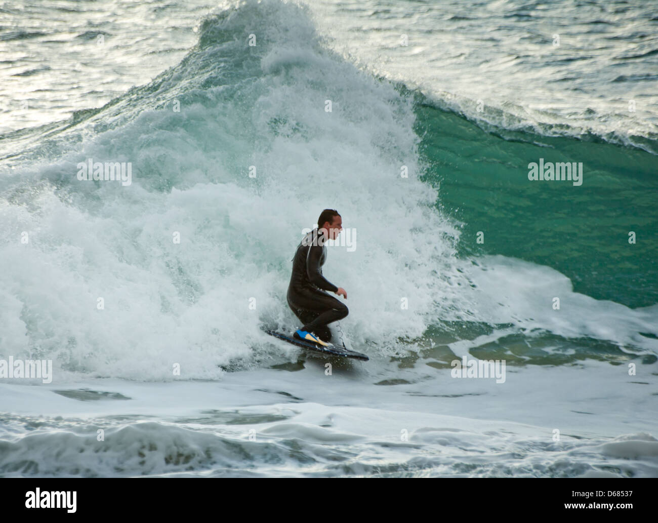 Surfers in Porthcurno, Cornwall Stock Photo - Alamy