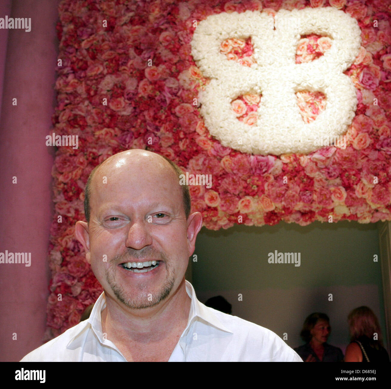 Designer Brian Rennie of the label Basler smiles after the fashion show ...