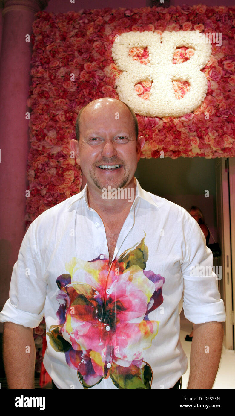 Designer Brian Rennie of the label Basler smiles after the fashion show ...