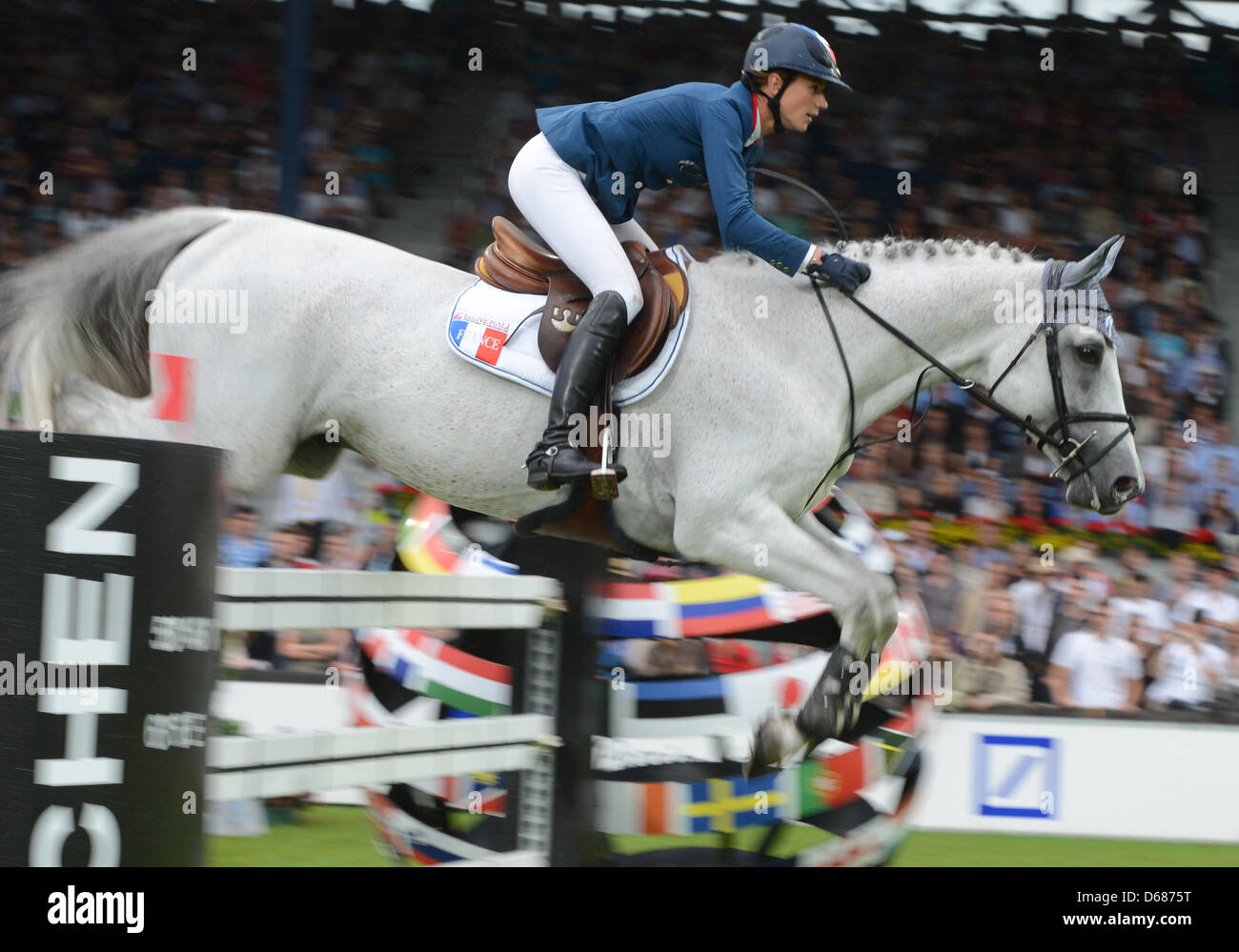 French show jumper Penelope Leprevost and horse Mylord Carthago jump ...