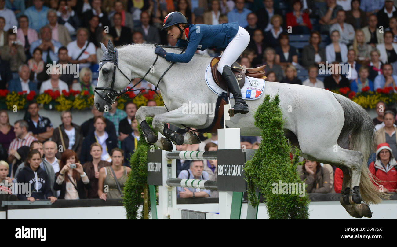 French show jumper Penelope Leprevost and horse Mylord Carthago jump ...
