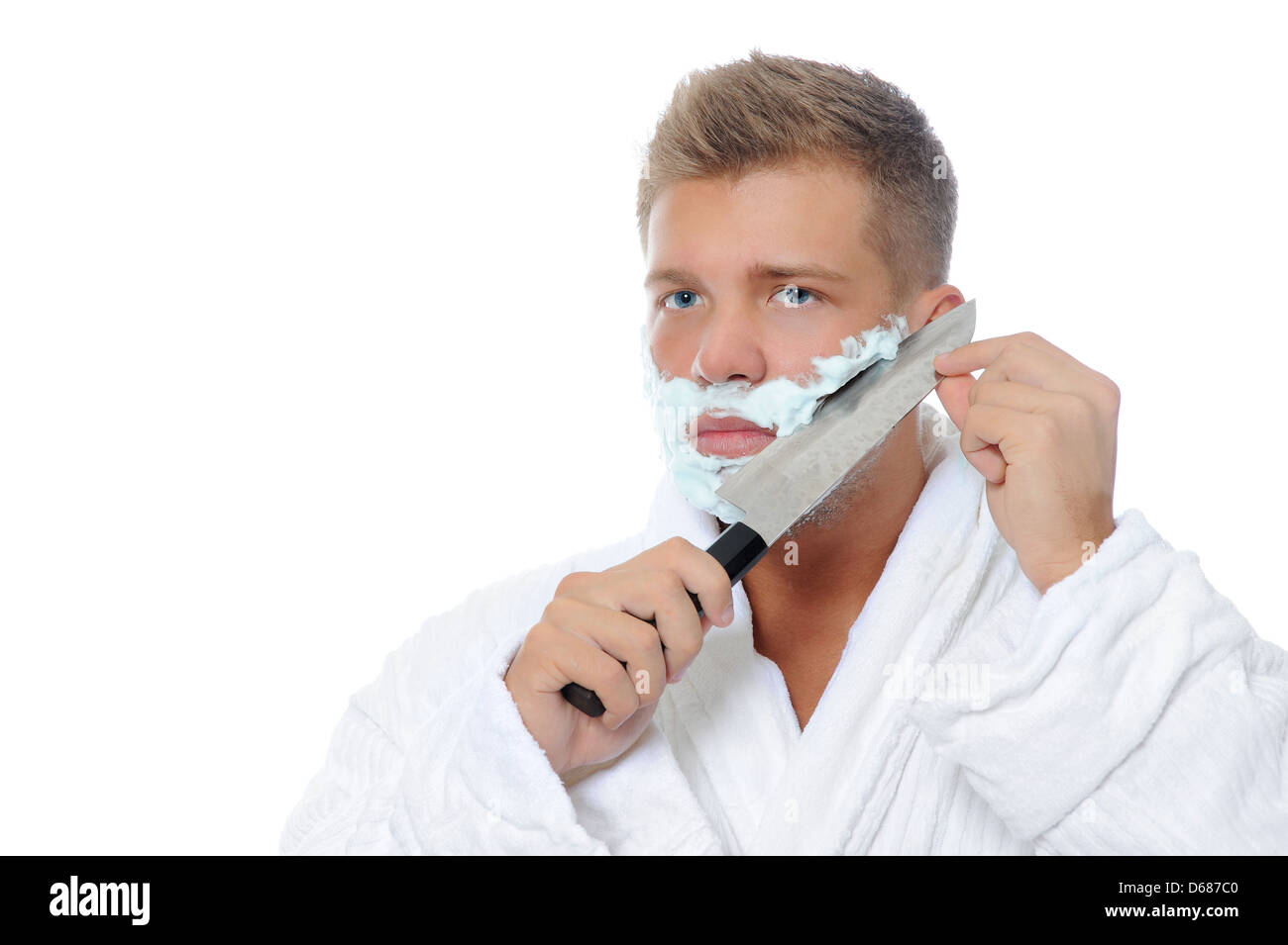 Young man shaving Stock Photo - Alamy