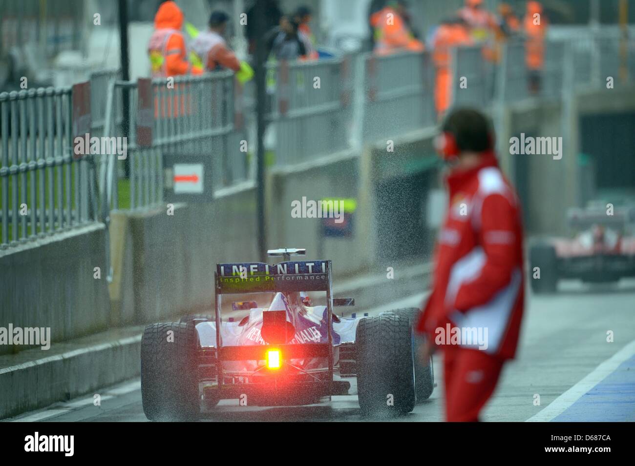 German Formula One driver Sebastian Vettel of Red Bull steers his car ...