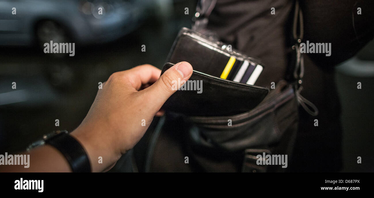 (ILLUSTRATION) An illustration dated 06 July 2012 shows a hand reaching ...