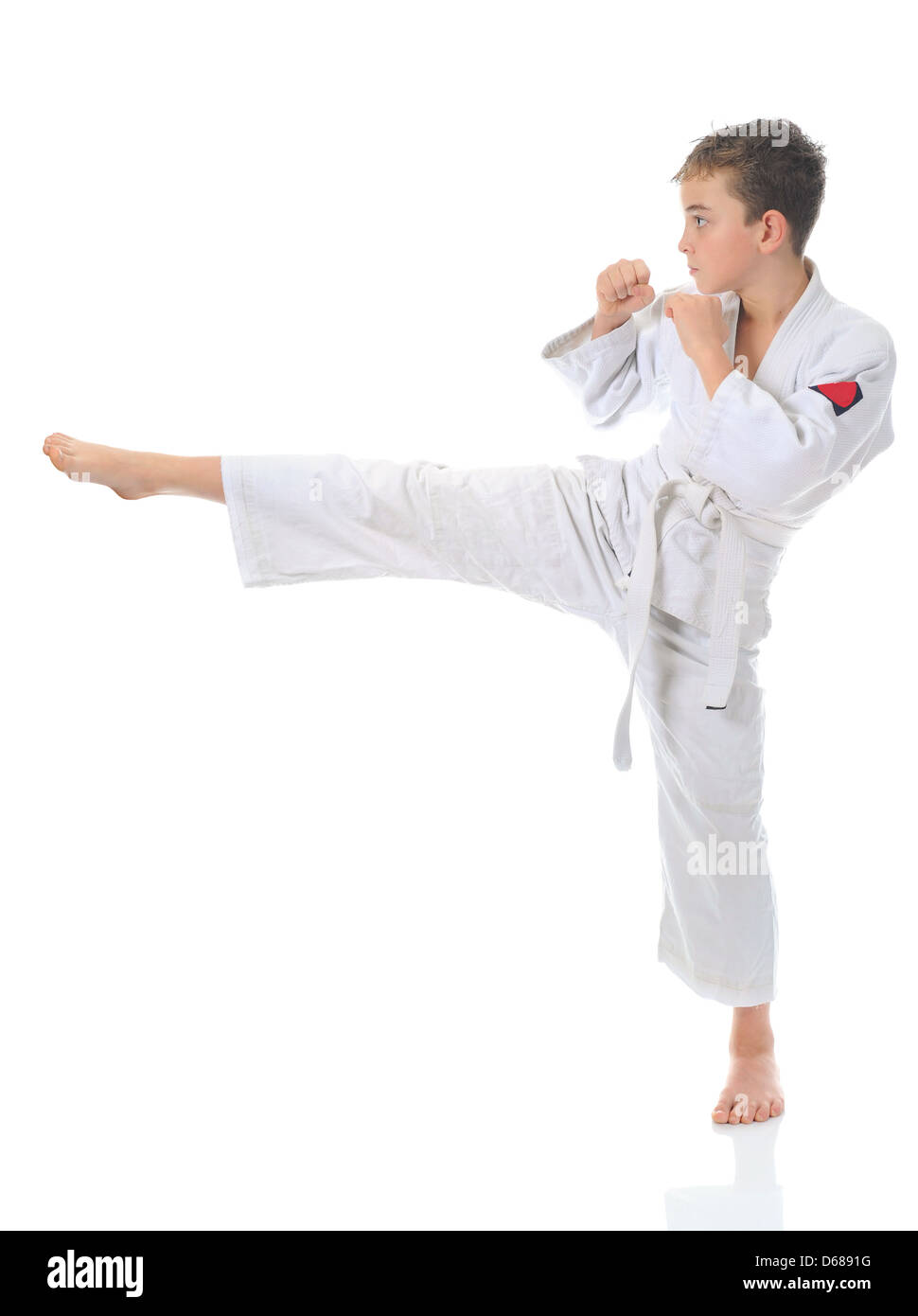 Young boy training karate Stock Photo - Alamy
